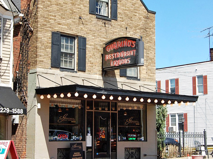 The stone facade of Guarino's stands proudly on Mayfield Road, string lights twinkling with promise like a culinary lighthouse in Cleveland's Little Italy.