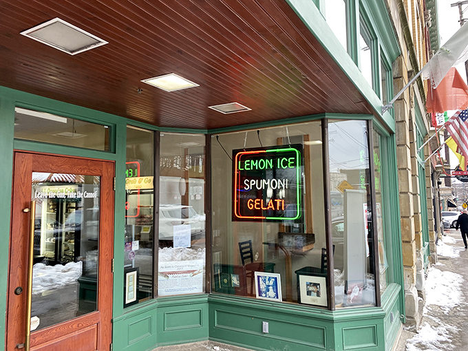 That neon sign isn't just advertising &ndash; it's a siren call to dessert lovers. Lemon ice, spumoni, and gelati await your willing surrender.