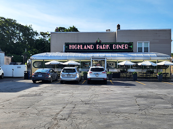 The gleaming stainless steel exterior of Highland Park Diner shines like a beacon of breakfast hope on Rochester's South Clinton Avenue.