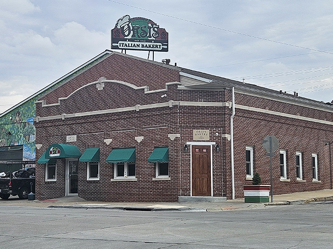 That green awning marks the spot where Nebraska's pizza game reaches heights other states only dream about achieving.