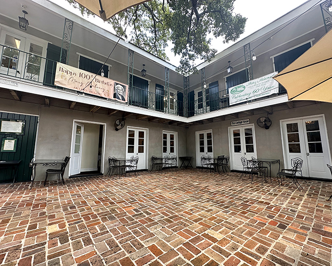 This courtyard has witnessed more celebrations than a championship locker room, with brick pavers that could tell stories if only they could talk.