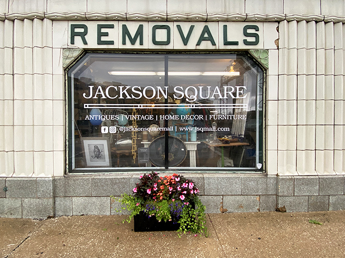 The distinctive facade of Jackson Square beckons with Art Deco charm and architectural details that whisper, "Come in, the past is waiting for you."