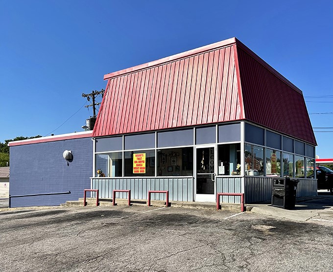 The iconic red-roofed sanctuary of breakfast dreams stands proudly in Henderson, beckoning hungry souls with its no-frills promise of biscuit perfection.