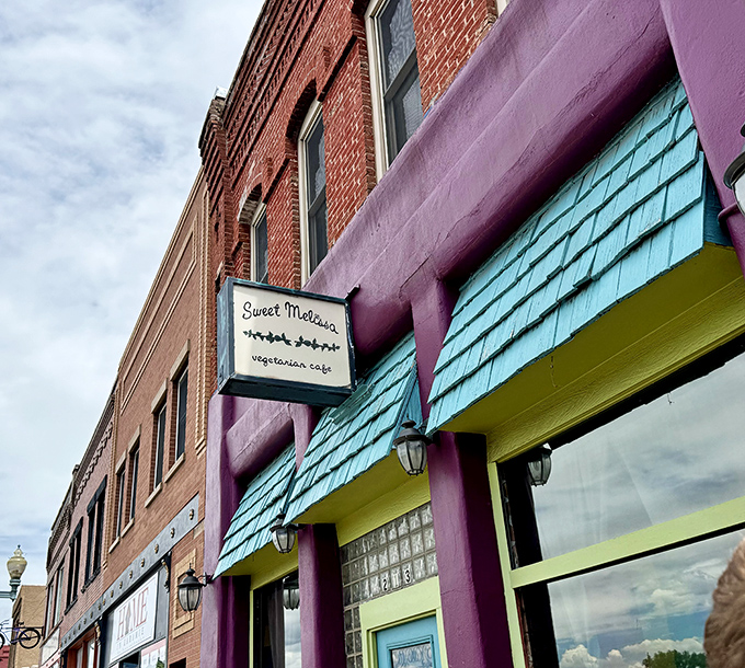 The purple building that stops traffic on Grand Avenue isn't just eye-catching&mdash;it's a promise of culinary adventure waiting behind that turquoise door.