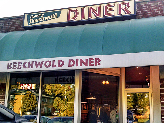 The turquoise awning of George's Beechwold Diner beckons like a beacon of breakfast hope in Columbus. No fancy frills, just the promise of honest-to-goodness diner delights.