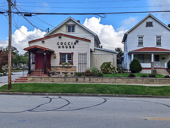 The unassuming white clapboard exterior of Coccia House hides culinary treasures that locals have cherished for generations. Pizza paradise in disguise!