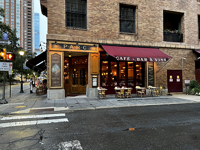 The golden-hour glow bathes Parc's entrance in warm light, turning an ordinary Philadelphia evening into a Parisian dream sequence.