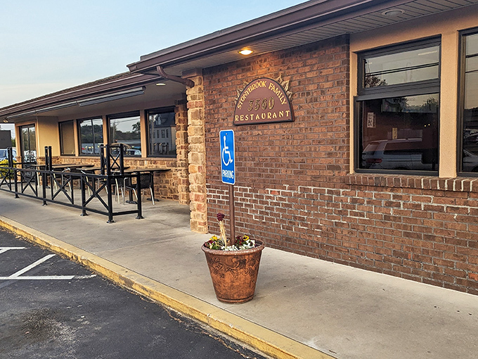 The unassuming brick exterior of Stonybrook Family Restaurant&mdash;where the real curb appeal isn't the architecture, but the aroma of breakfast wafting through the parking lot.