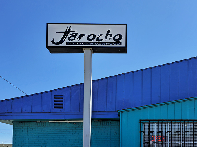 That turquoise exterior isn't just a color choice&mdash;it's a promise of coastal flavors waiting inside this unassuming Kansas City gem.