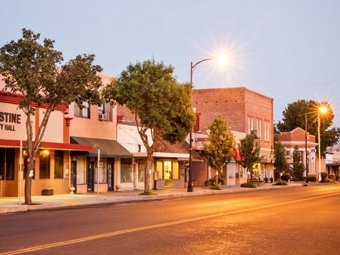 Downtown Gustine at golden hour, where the streetlights come on before you've finished your coffee. Small-town charm without the small-town parking nightmares.