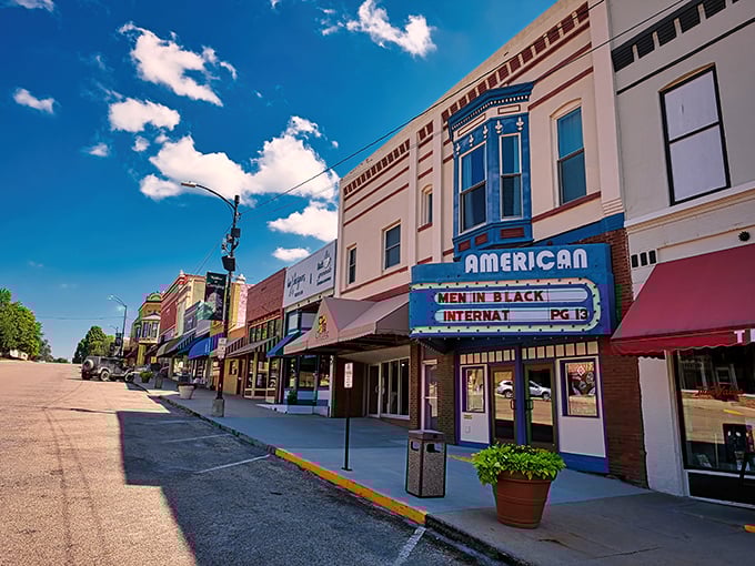 Davis Avenue stretches toward the horizon like a Norman Rockwell painting come to life, complete with the iconic American Theatre marquee.