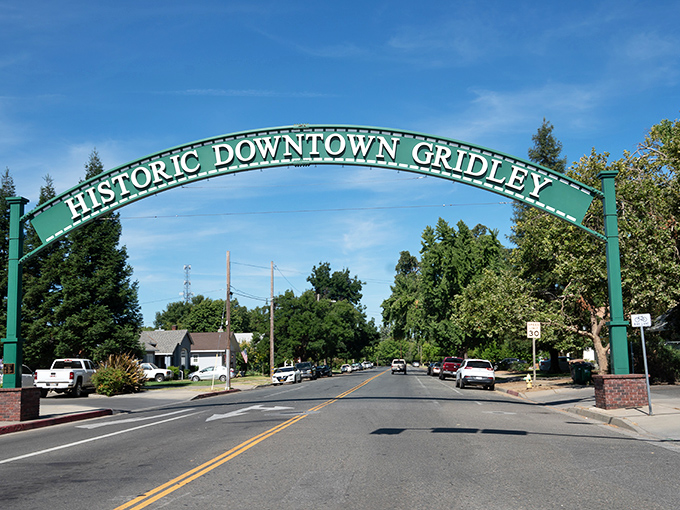 The iconic green arch welcomes you to Historic Downtown Gridley, where time slows down and your retirement dollars stretch further.