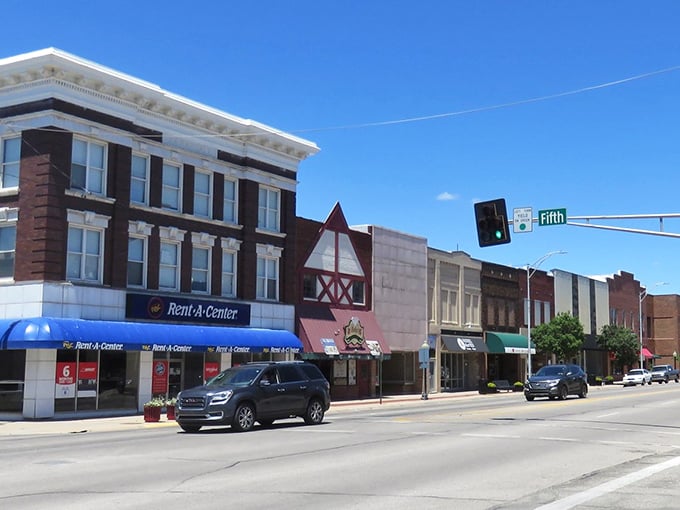 Historic brick buildings stand shoulder-to-shoulder along Main Street, like old friends who've weathered a century of Kansas storms together.