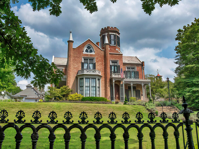 The Castle's imposing Gothic Revival facade makes suburban McMansions look like garden sheds. Victorian elegance at its finest, complete with tower and crenellations.
