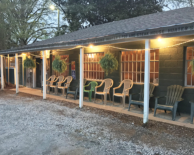 The unassuming green exterior of Hunter's Pub & Steakhouse proves once again that culinary treasures often hide in plain sight. That American flag isn't just patriotic&mdash;it's a beacon for hungry travelers.