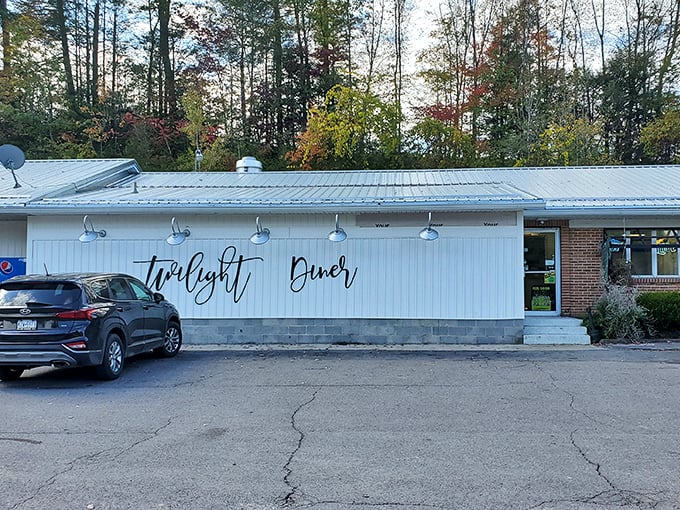 The unassuming exterior of Twilight Diner proves once again that culinary treasures often hide in plain sight, beckoning hungry travelers with its stylish script signage against classic white siding.