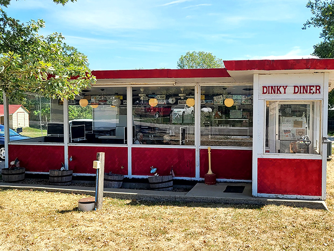 From another angle, this unassuming roadside gem reveals its true character - a time capsule of Americana where calories don't count and conversations flow as freely as the coffee.