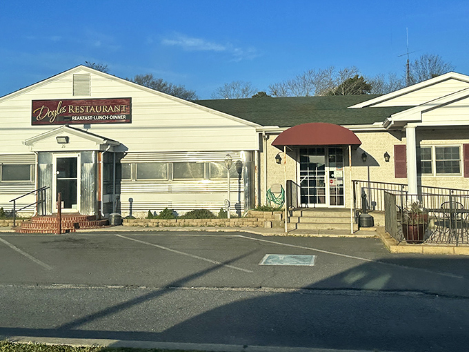 Doyle's Restaurant wears its unpretentious charm like a badge of honor. Those brick steps have welcomed generations of satisfied diners.