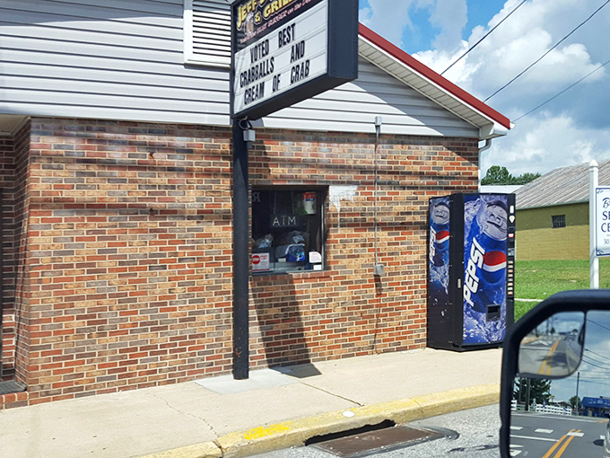 The bright red awning of Jeff's Taproom & Grille stands out like a culinary lighthouse, boldly proclaiming "BEST BURGERS ON DELMARVA" – a promise they deliver on with gusto.