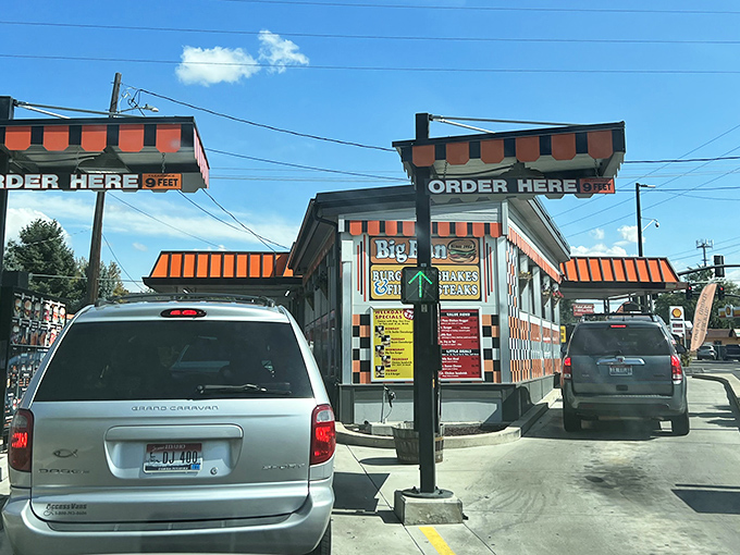 The iconic soft-serve sign stands sentinel outside Big Bun, a beacon of hope for the hungry and a monument to simpler culinary pleasures. 