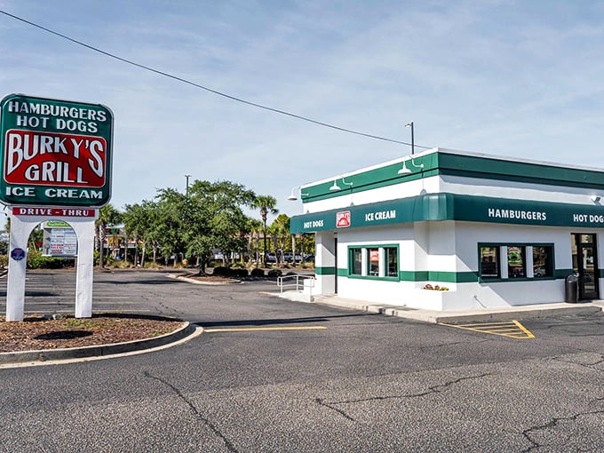 The iconic green and white Burky's sign stands like a beacon of hope for hungry travelers&mdash;promising simple pleasures executed with surprising perfection.