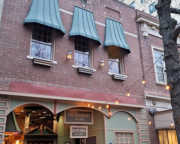 The Rookery's historic brick fa&ccedil;ade with teal awnings isn't just inviting&mdash;it's practically winking at you to come inside for burger bliss.