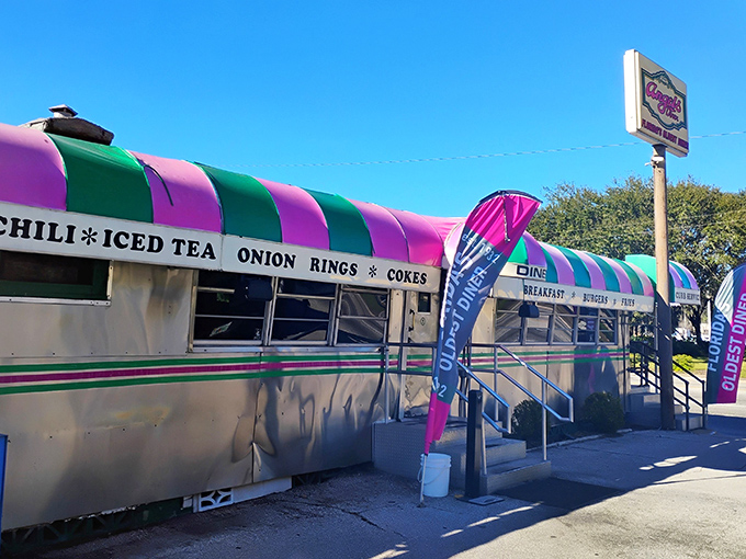 That turquoise and pink striped awning isn't just decoration &ndash; it's a beacon calling you home to burger paradise.