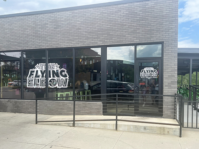 The modern brick façade of The Flying Elbow might look unassuming, but inside awaits a flavor smackdown that'll have your taste buds tapping out in pure joy.