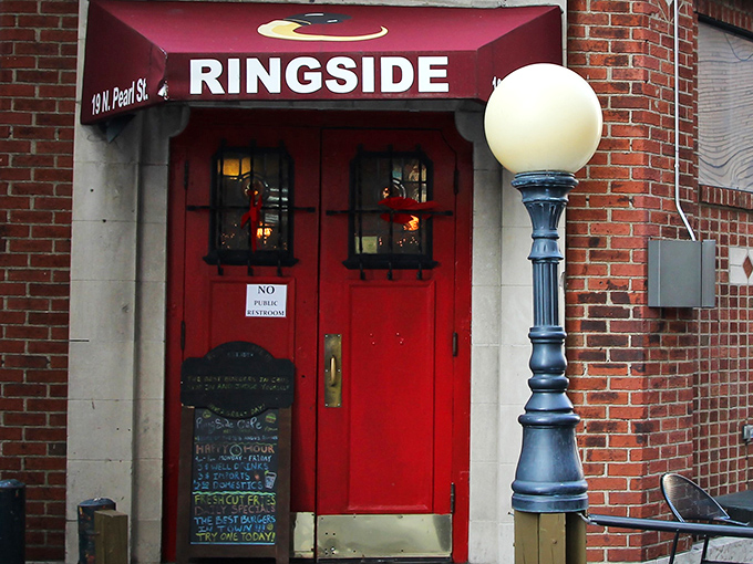 Those iconic red doors aren't just an entrance&mdash;they're a portal to burger paradise. The vintage lamppost stands guard like a culinary lighthouse.