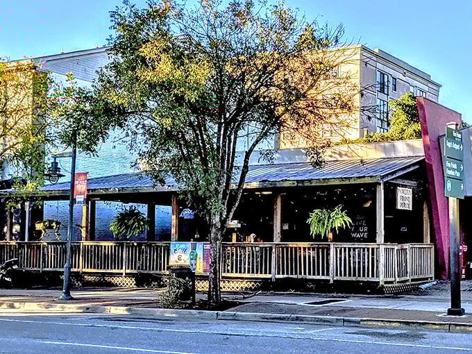 The welcoming wraparound porch at Pawleys Front Porch invites you in like an old friend, promising comfort food and good times ahead.