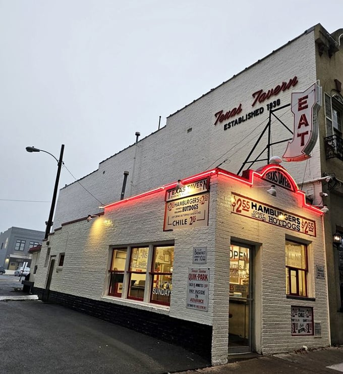 As dusk settles over Roanoke, Texas Tavern's neon sign burns bright against the evening sky, a beacon for night owls and early birds alike.