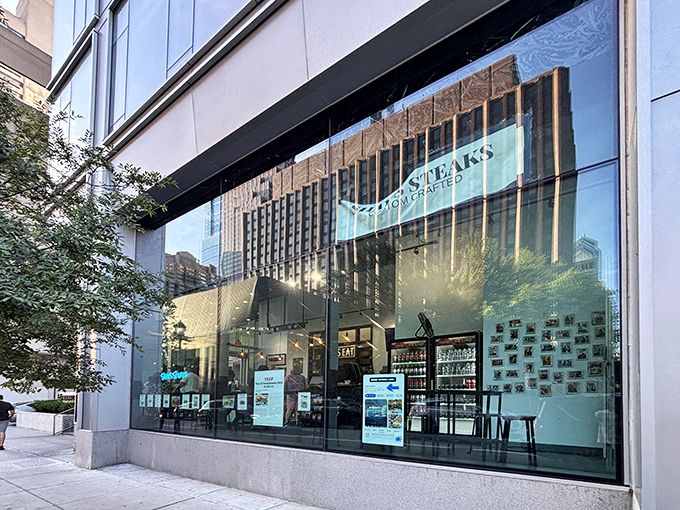 The sleek glass storefront of Shay's Steaks gleams in Philadelphia's urban landscape, promising a modern twist on the city's most famous culinary tradition.