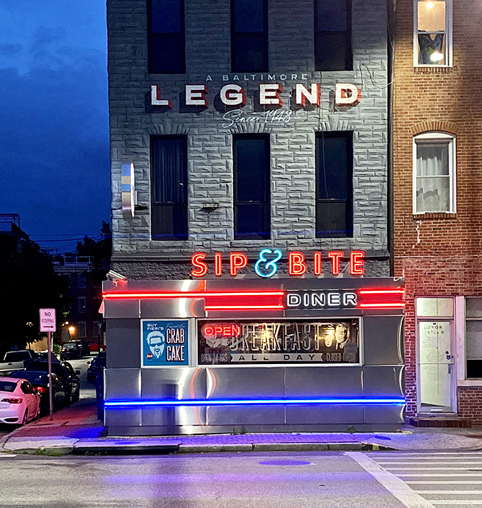 The neon glow of Sip & Bite beckons like a lighthouse for the hungry, promising salvation in the form of perfect pancakes and endless coffee refills.