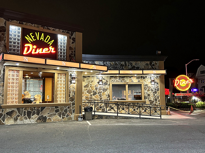 The neon glow of Nevada Diner's sign against its stone facade is like a lighthouse for hungry travelers on Bloomfield's Broad Street. Classic Jersey diner perfection.