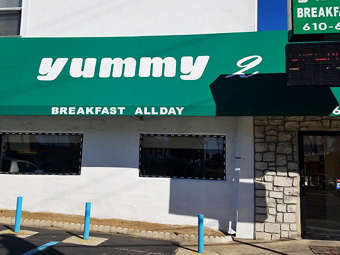 The bright green awning of yummy2 stands as a beacon of breakfast hope on an otherwise ordinary Clifton Heights street corner.