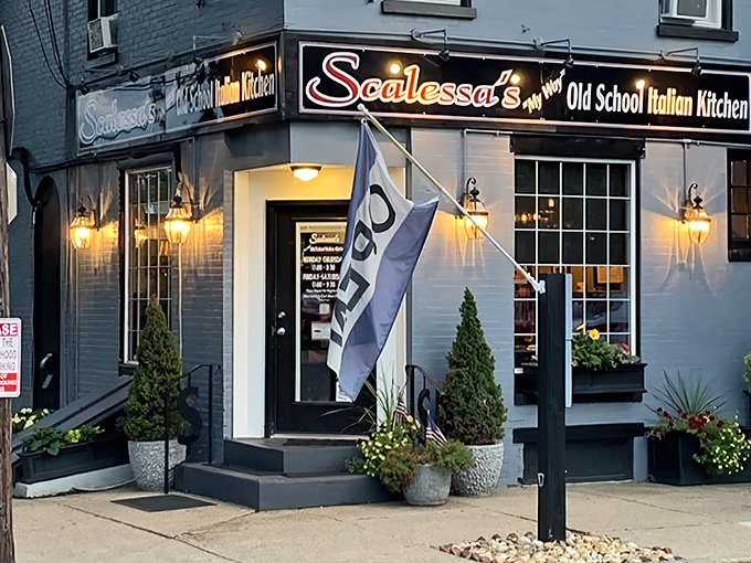 The blue-gray exterior of Scalessa's glows with old-school charm at dusk, like a beacon calling hungry souls home to mama's cooking.
