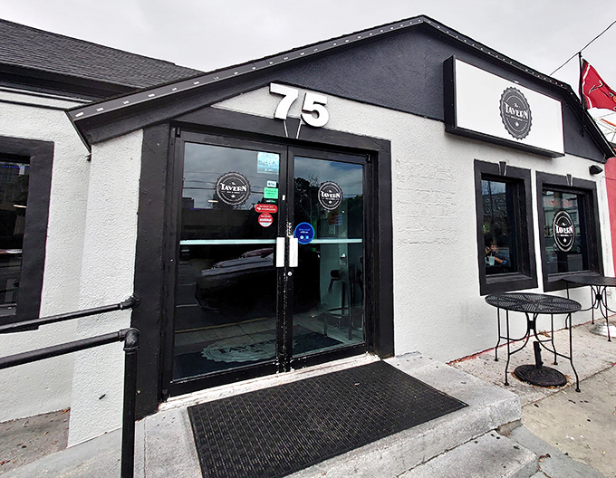 That striking black and white exterior might look modest, but behind those doors lies nacho nirvana waiting to happen.