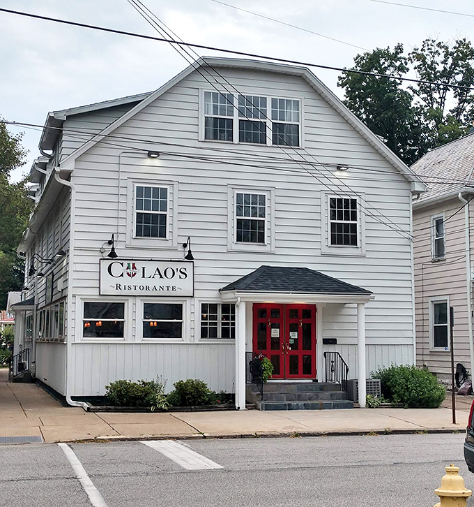 Those striking red doors against the white exterior are like a culinary bat signal, beckoning hungry Pennsylvanians to authentic Italian bliss.