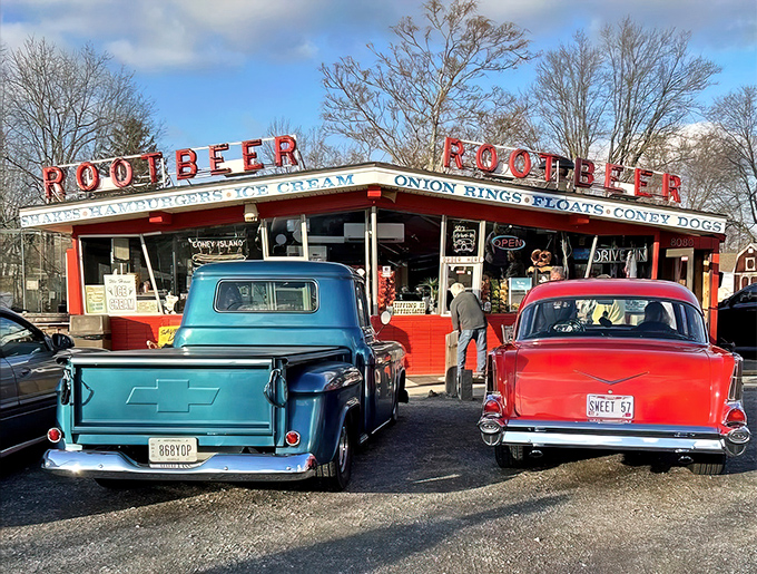 Classic cars meet classic flavors at THE Root Beer Stand, where time stands still but hunger doesn't. Those neon letters promise a trip back to simpler, more delicious times.