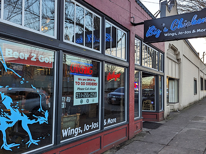 The blue neon glow of Big's Chicken beckons like a lighthouse for the hungry. Portland's unassuming chicken temple proves great food doesn't need fancy digs.