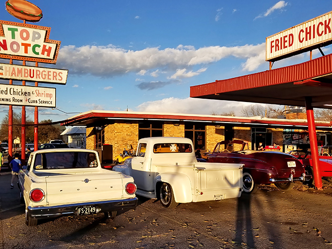 That iconic roadside sign and vintage drive-in canopy will make you slow down faster than spotting a speed trap.