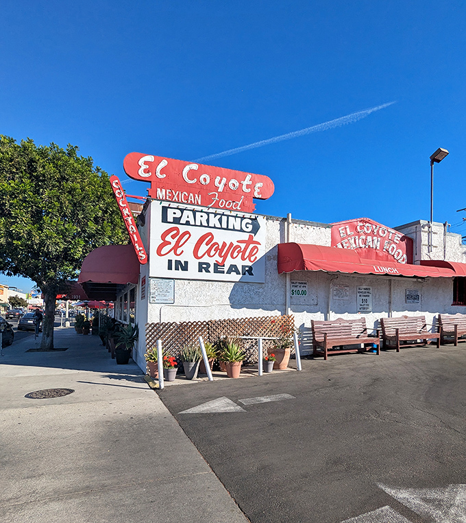 The iconic red and white sign of El Coyote has been beckoning hungry Angelenos for decades, promising Mexican comfort food and good times ahead.