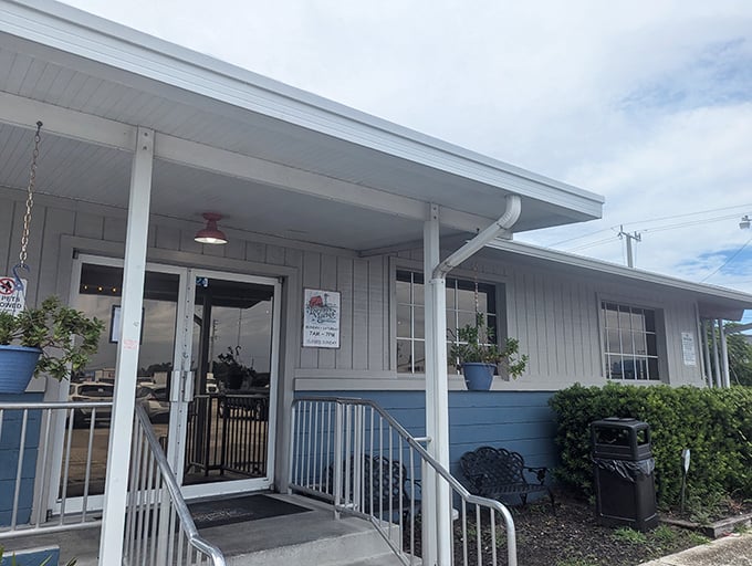 The unassuming blue and white exterior hides culinary treasures within, like finding a secret food paradise in plain sight.