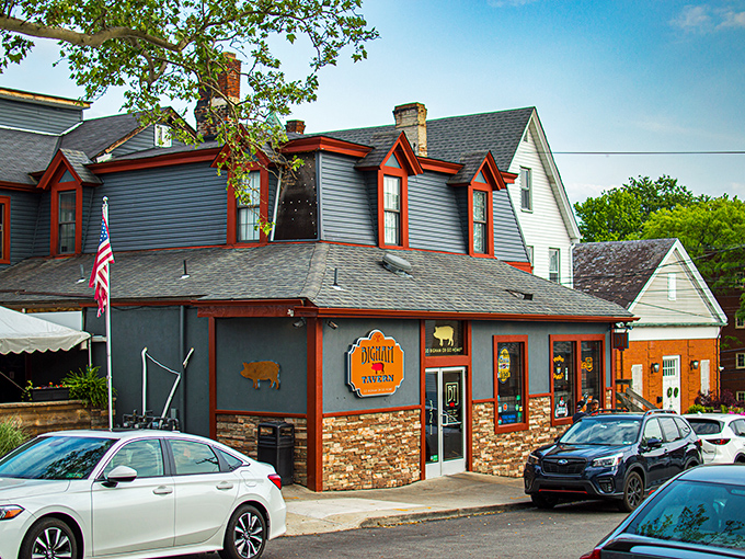 The charming exterior of Bigham Tavern stands proudly in Mount Washington, its stone-and-wood facade promising comfort and legendary wings within.