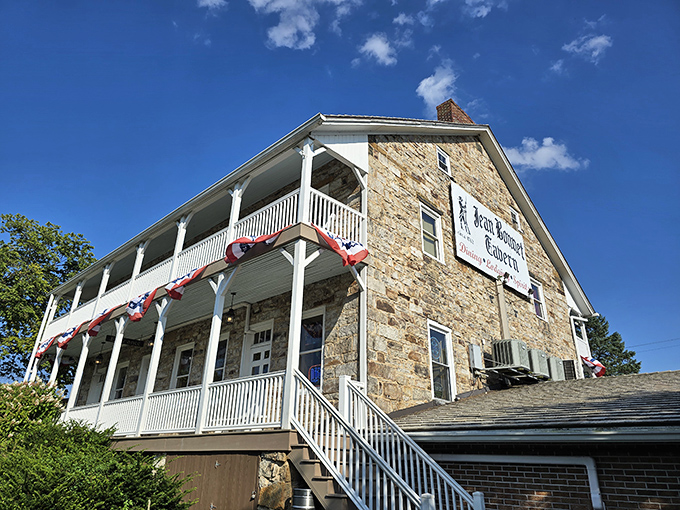 The historic stone fa&ccedil;ade of Jean Bonnet Tavern stands proudly against the Pennsylvania sky, a culinary time capsule waiting to be explored.