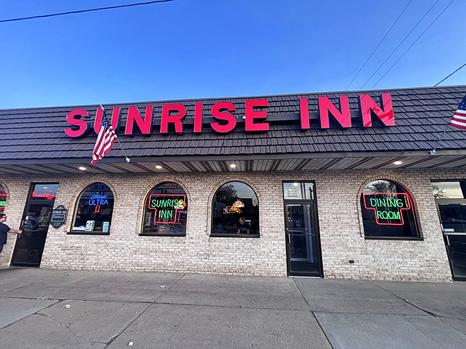 The iconic red signage of Sunrise Inn stands out against the Ohio sky like a beacon for hungry travelers. No fancy frills, just the promise of honest-to-goodness deliciousness inside.
