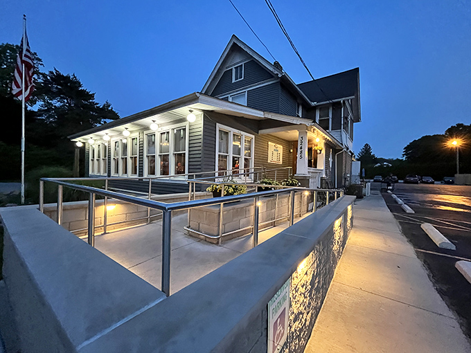 Jake's On Lake transforms into a welcoming beacon at dusk, its illuminated porch practically whispering "come hungry, leave happy" to passersby.