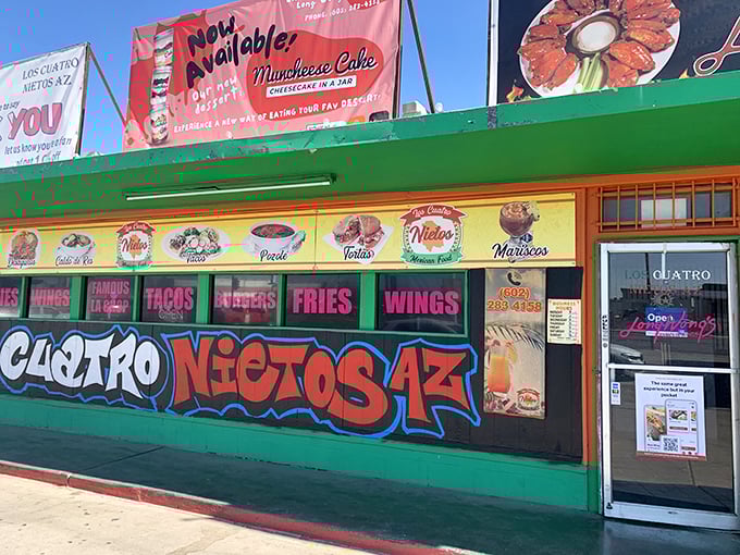 The vibrant exterior of Los Cuatro Nietos announces itself like a fiesta waiting to happen, complete with colorful signage that practically shouts "delicious food inside!"