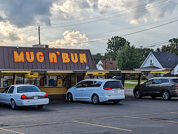 Cars lined up at the carhop stations like it's 1960 and nobody told them the party ended.