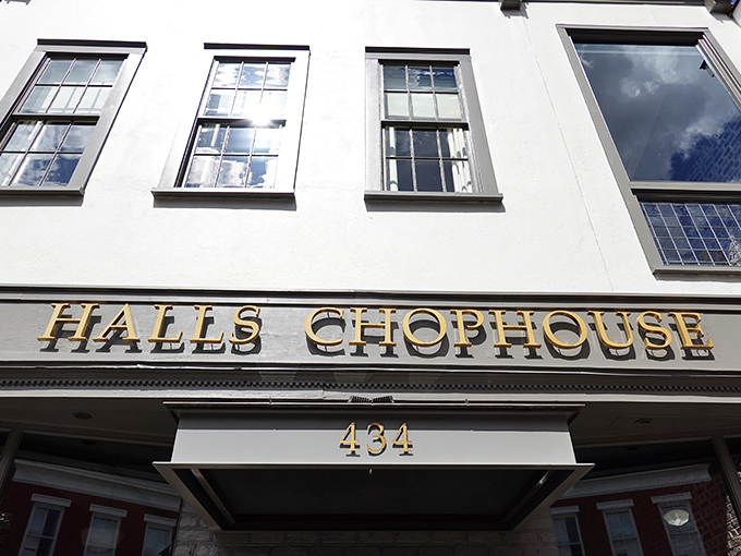 The gleaming gold lettering against the crisp white facade announces your arrival at beef paradise. Charleston's culinary crown jewel beckons.